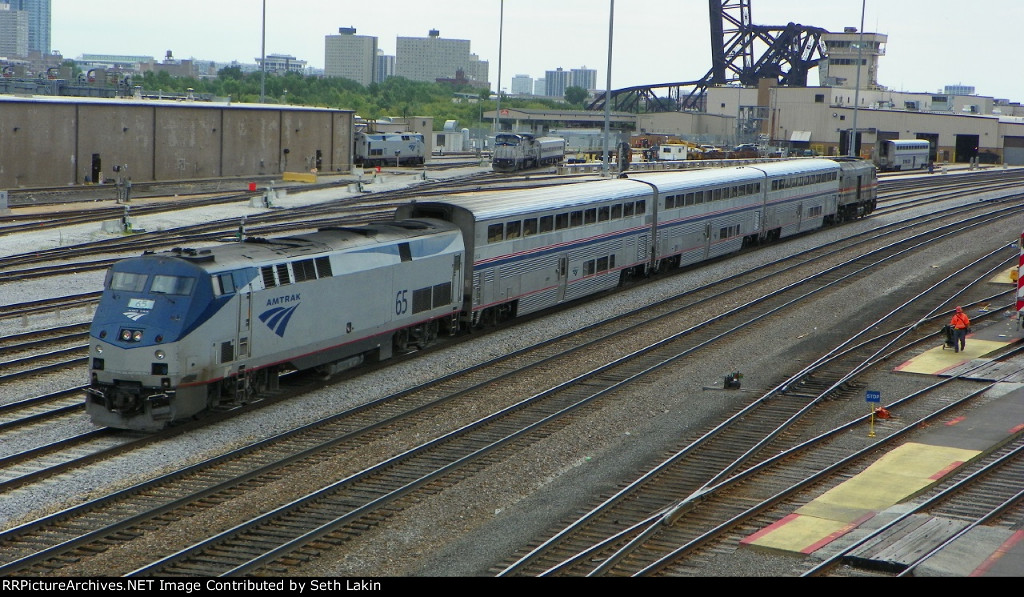 AMTK 65 taking #371 to Service